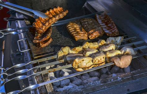 Assorted Meats Being Grilled Cooked Barbecue Grill Outdoors Stock