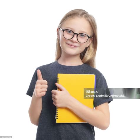 Cute Girl In Glasses With Books Showing Thumb Up On White Background