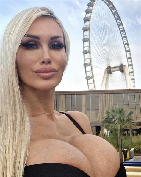 In A Phase Of Loving The Look Of Huge Fake Tits Filling Up A Tank Top