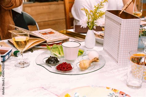 Passover Table Setting With A Traditional Passover Seder Plate With