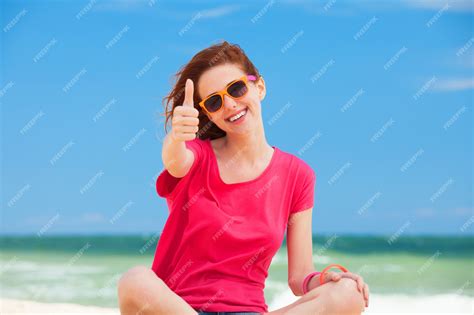 Premium Photo Funny Teen Girl Sitting On The Sand At The Beach