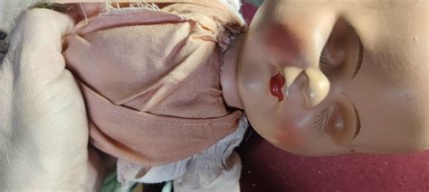 Three Faced Doll Antiques Board