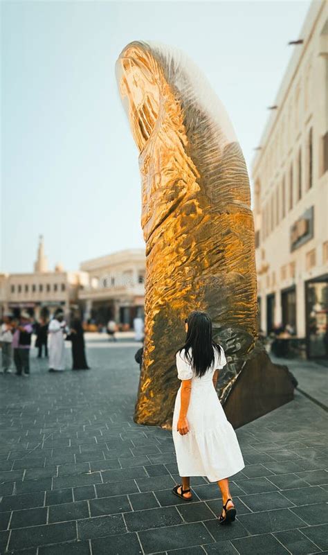 Doha Qatar 22nd January 2026 Woman Walking Toward Monumental Thumb