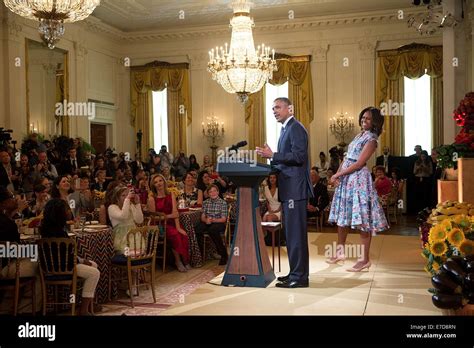 Us President Barack Obama Joins First Lady Michelle Obama Onstage For A
