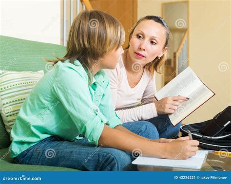 Mother With Son Doing Homework Stock Image Image Of Indoors