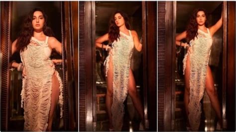 Photos Nora Fatehi Raises Temperature In Nude Thigh High Slit Dress
