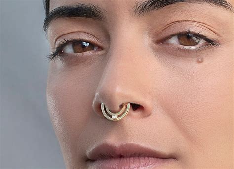 Gold Septum Ring A Symbol Of Achievement In The Workplace Wear Fortune