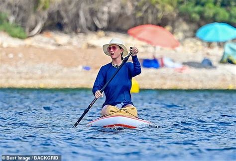 Katy Perry Covers Up As She Enjoys Paddle Boarding Session With Fiancé