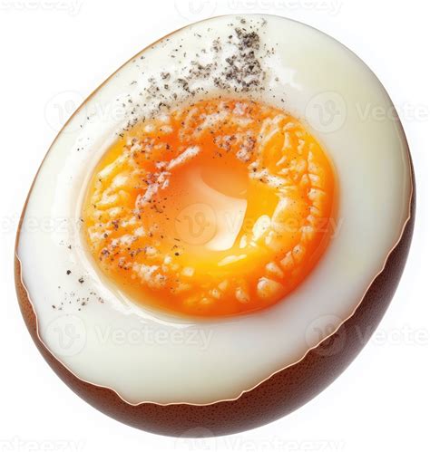 A Close Up View Of A Perfectly Cooked Brown Egg Sliced Open To Reveal