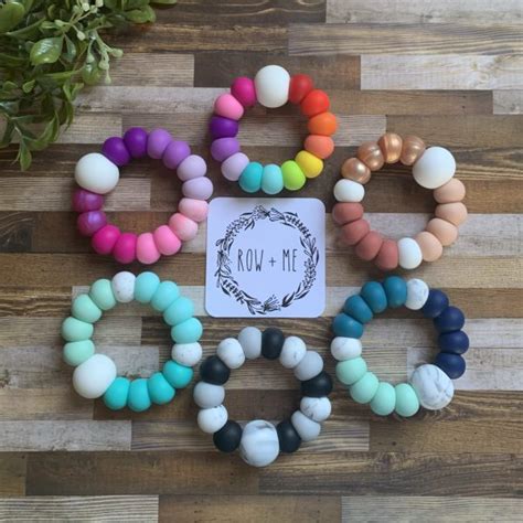 Rainbow Teether Collection Row Me