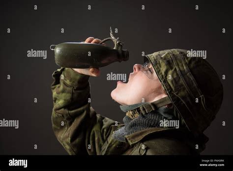 Thirsty Soldier And Last Water Droplets Portrait Of Female Soldier Who