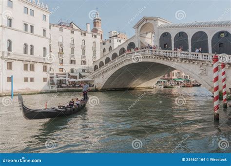 Beautiful Shot Of A Gondola Sailing Under The Rialto Bridge In Venice