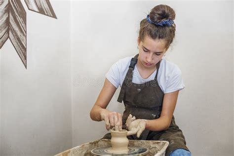Teenage Girl Creates Pottery In Pottery Workshop Creative Process
