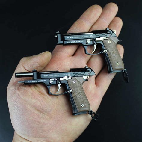 Mini Metal Gun Keychain Fashion And Collectible Item