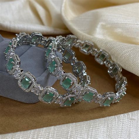 Emerald Elegance Rhodium Plated Bangles With Cz And Mint Green Stone