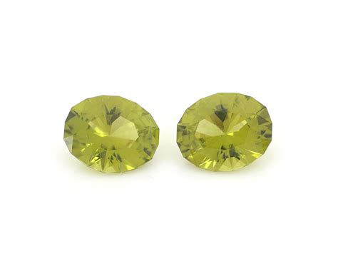 At Auction Lot 2 Loose Peridots