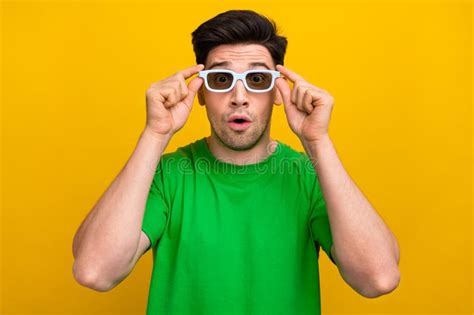 Portrait Of Impressed Guy Wear Stylish T Shirt Touching 3d Glasses