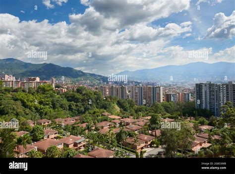 Beautiful Shot Of Medellin City Surrounded By Greenery Covered
