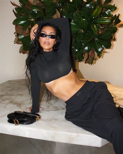 Kim Kardashian On Brink Of Wardrobe Malfunction As She Nearly Spills