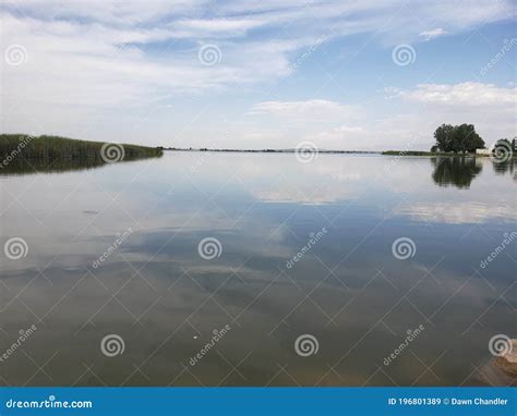 Lake Reflecting Clouds Reeds Stock Image Image Of Marsh River 196801389
