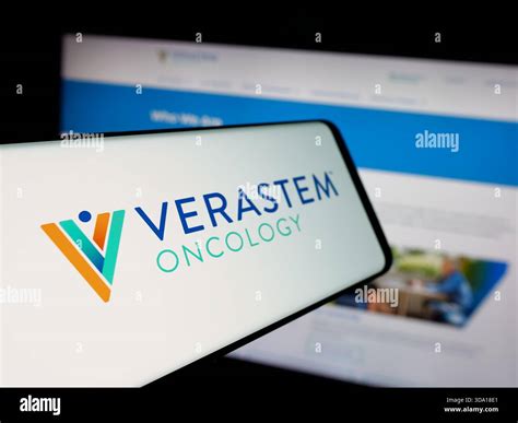 In This Photo Illustration A Smartphone With The Logo Of Us Oncology