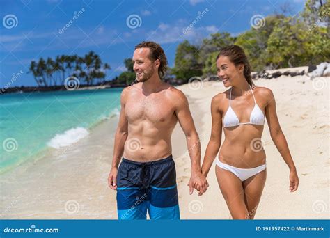 Beach Bikini Couple Enjoying Summer Vacation Travel Holding Hands On