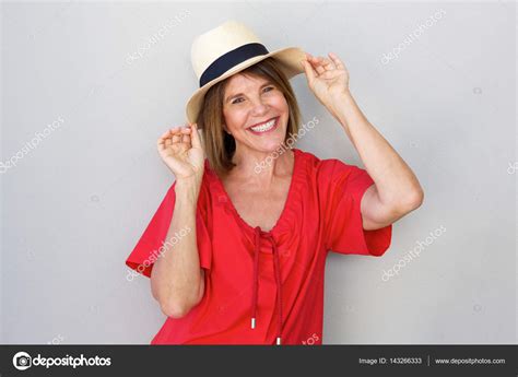 Older Woman In Hat Smiling Stock Photo Mimagephotos