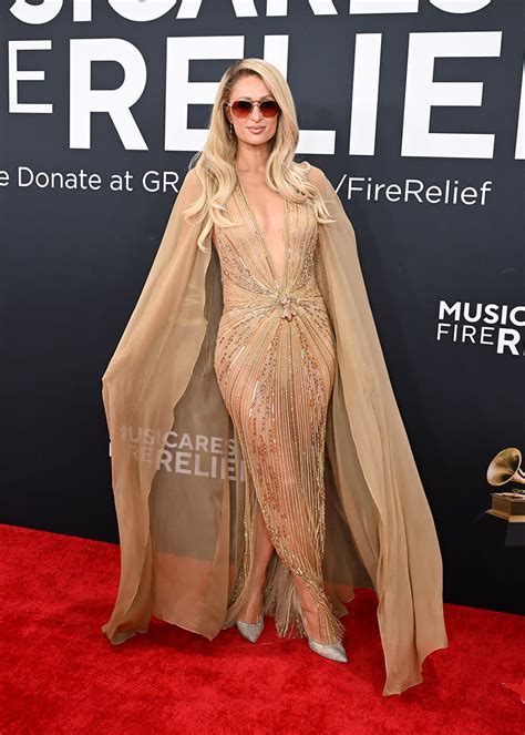 Paris Hilton Glimmers In Sheer Chrome Hearts Dress With Cape For