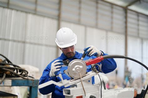 Robotics Engineer Fitting Sensors To Traditional Engineering Lathe In