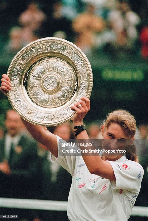 German Tennis Player Steffi Graf Holds Up The Venus Rosewater Dish