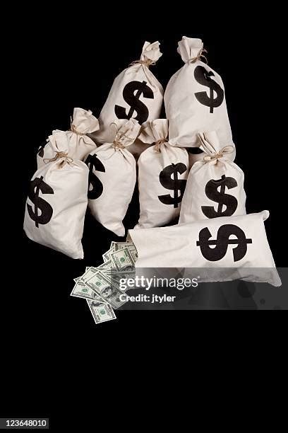 Exploding Money Bag Photos And Premium High Res Pictures Getty Images