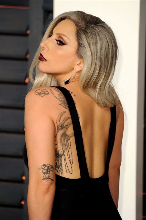 Lady Gagas Tattoos The Meaning Behind Her 10 Best From David Bowie