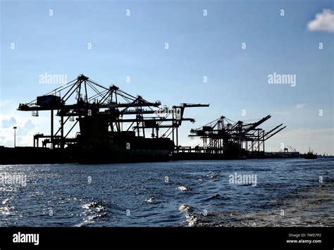 A Large Container Loading Facility With Gantry Cranes Seen In