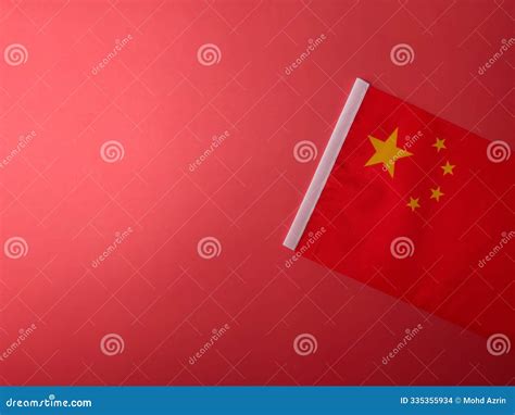 Top View China Flag On A Red Background With Copy And Text Space Stock