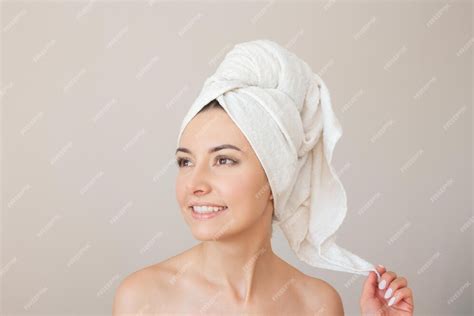 Premium Photo Naked Woman With A Towel Wrapped Around Her Head