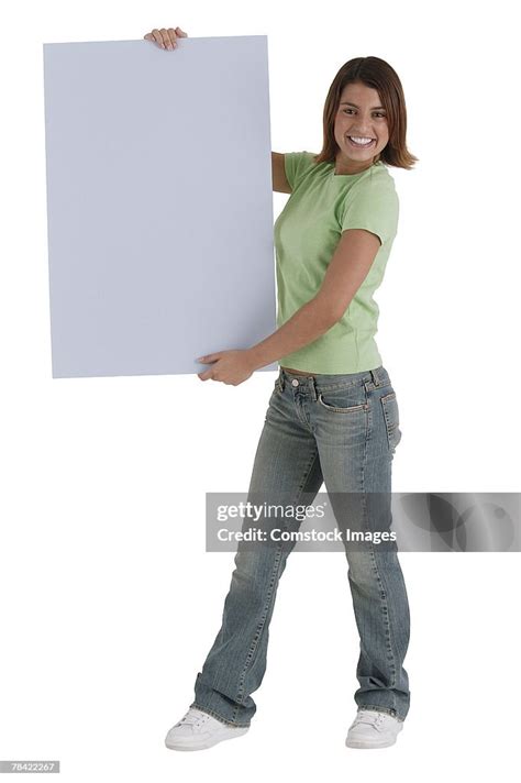 Girl Posing With Blank Sign Photo Getty Images