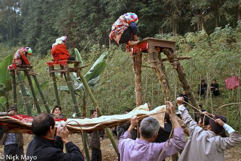 Boy Falling Backwards At Dujie Gung Jie Po Yunnan China 2007