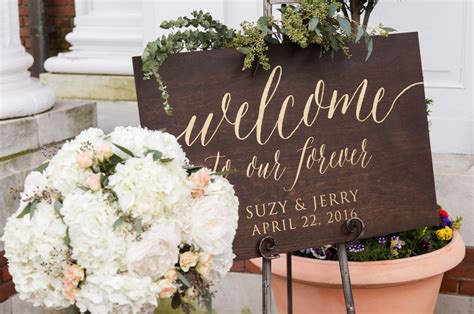 Suzy And Jerry Hydrangea Ivory Rose Blush Rose Spray Rose Seeded Euc Entrance Arrangement And