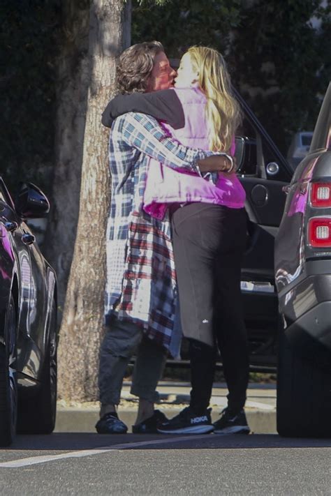 Elizabeth Berkley And Greg Lauren Share A Romantic Moment In Beverly