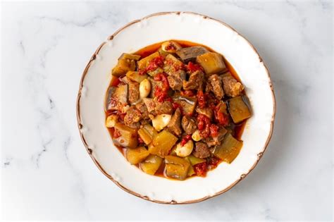 Premium Photo Top View Of Turkish Dish Guvech Baked Meat With Eggplant And Traditionally