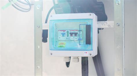 Small Electrical Switchboard With A Blue Plastic Protector Free Stock