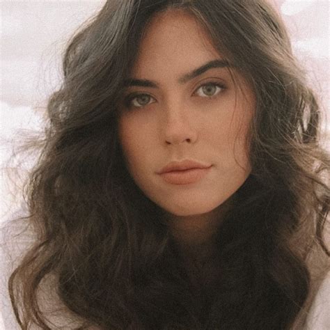 A Close Up Of A Person With Long Hair