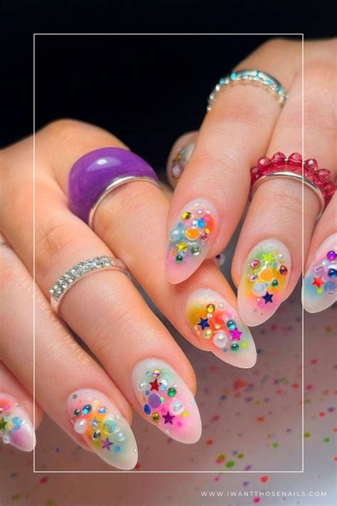 Get Ready To Wow With These Stunning Rainbow Cat Eye Nail Designs