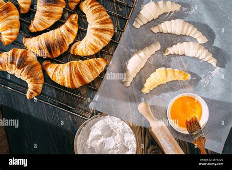 The Chef Cooks Croissants In The Kitchen In The Morning On The Table