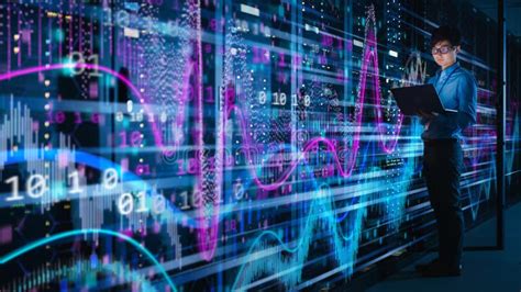 Shot Of Asian It Specialist Using Laptop In Data Center Full Of Rack