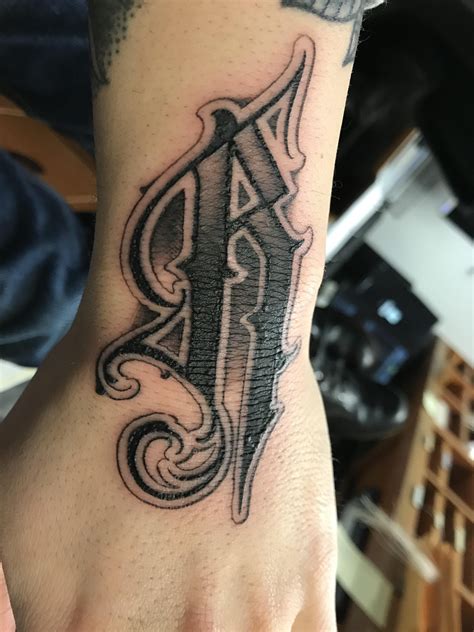 Fancy Letter R Tattoo