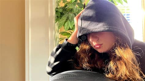 A Teenage Girl Pulled A Hood Over Her Eyes She Got Angry Pressed A
