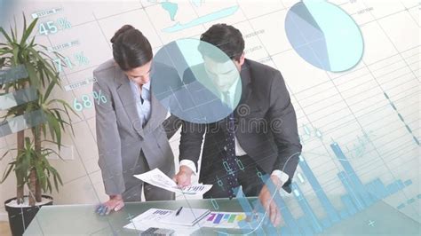 Analyzing Documents Business Professionals In Office With Financial Data Animation Overlay