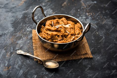 Premium Photo Wheat Laapsi Lapsi Shira Halwa Is An Indian Sweet Dish Made Of Broken Wheat