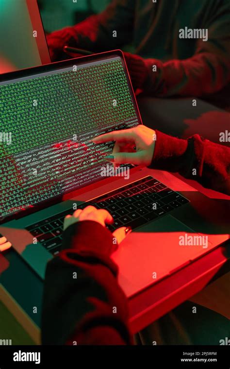 Anonymous People Using Computer And Programming To Break Code Cyber